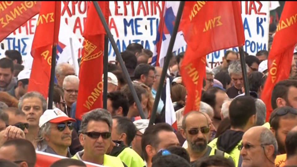 Greek Parliament OKs Harsh New Austerity Measures Amid Mass Protest